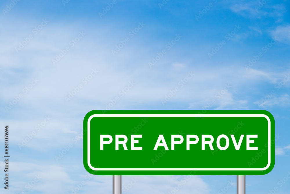 Green color transportation sign with word pre approve on blue sky with ...