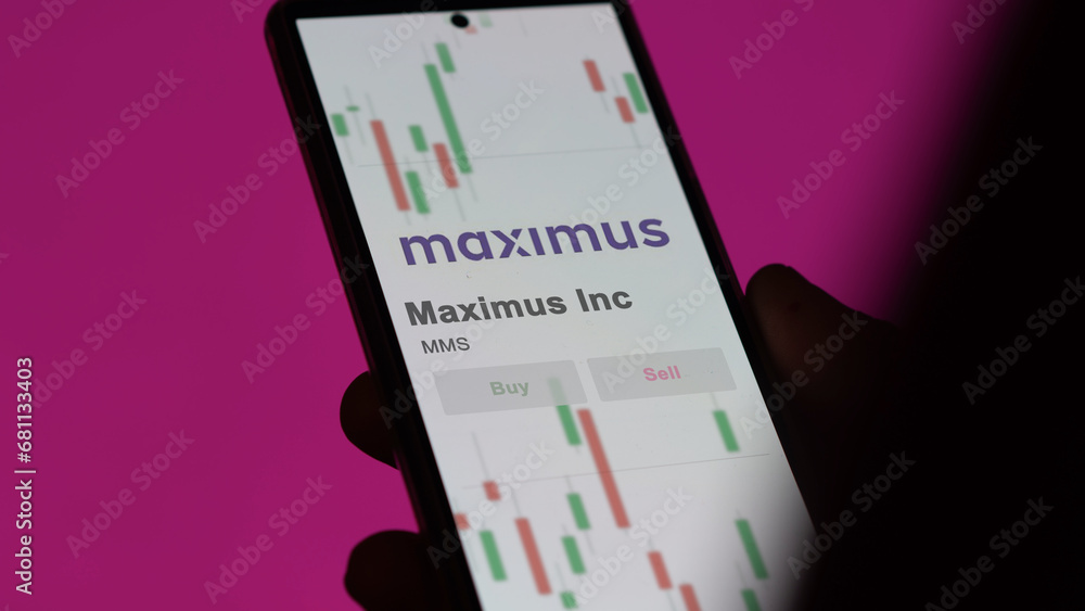 November 20th 2023. The logo of Maximus Inc on a giant white screen ...