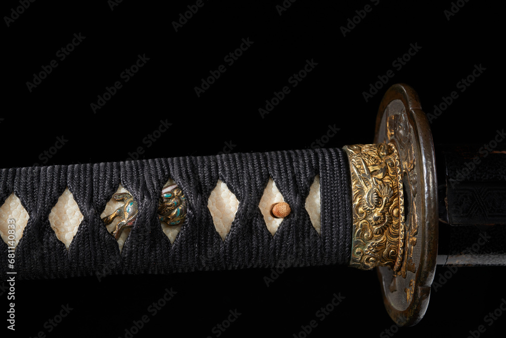 Antique handle katana sword with black binding and engraving Stock ...