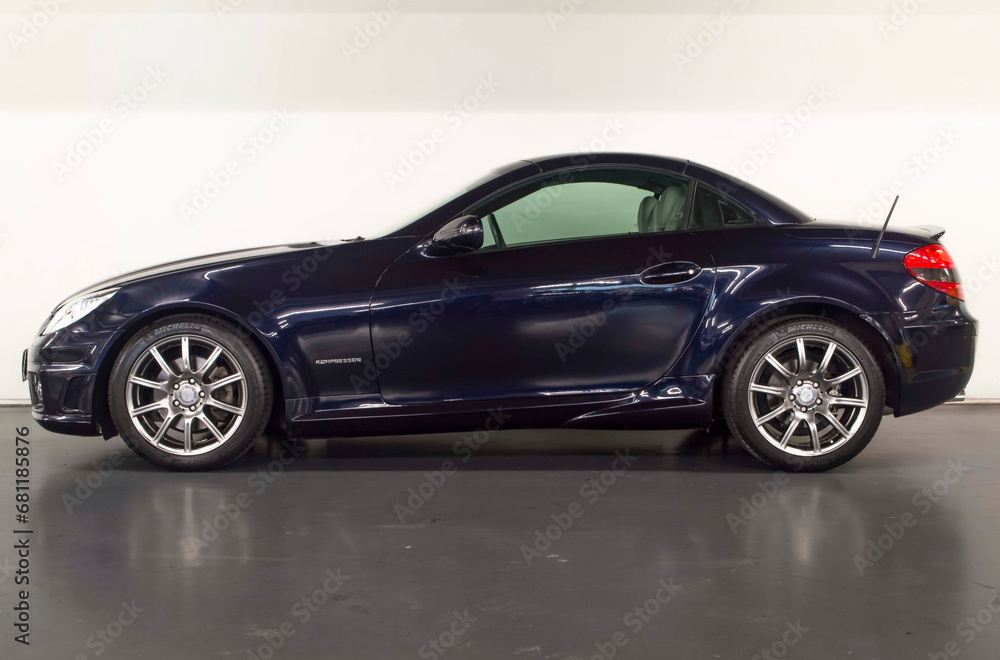 Dark Blue Mercedes Benz SLK 250 side view, convertible car with roof ...