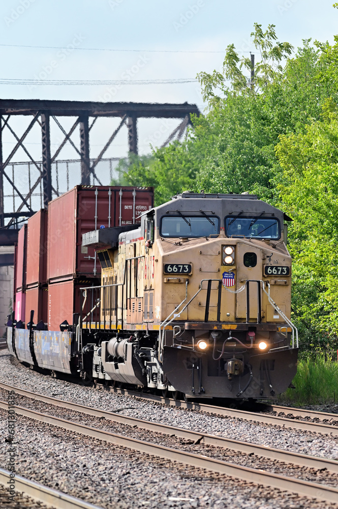 A single locomotive leads a Union Pacific Railroad intermodal freight ...