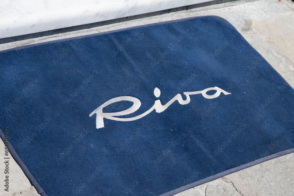 riva boot sign text and brand logo shop on entrance blue carpet sell ...