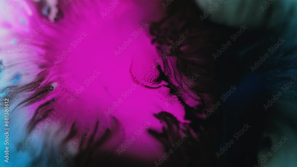 Ink drop. Paint splatter in water. Wet splash. Defocused neon magenta ...