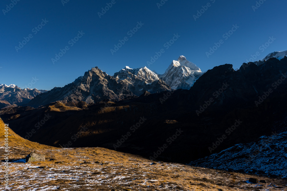 Early morning sunrise in the hImalayas of Nepal with Mt. Kumbhakarna ...