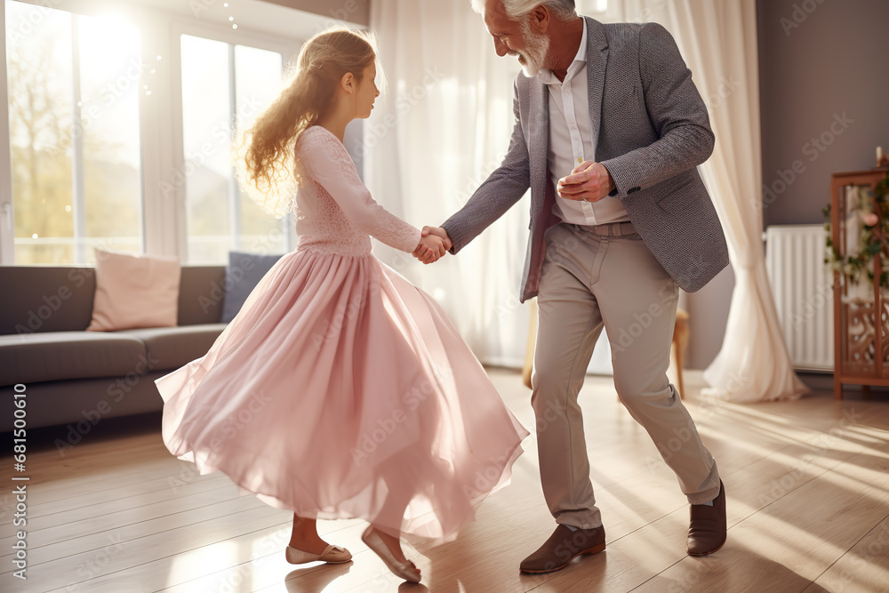 Elegant loving caring grandfather dancing with his cute little ...