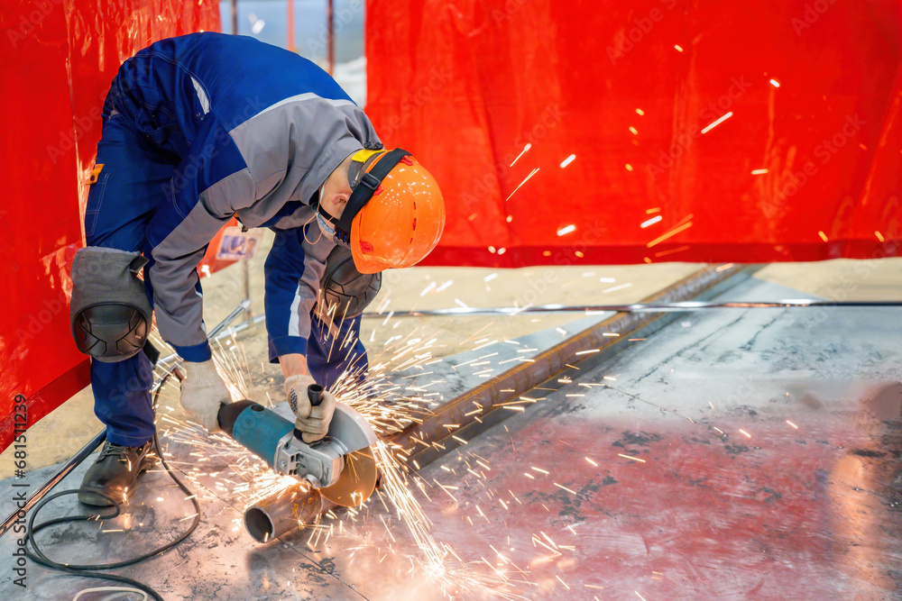 Man cuts pipe with circular saw. Preparation for pipeline installation ...