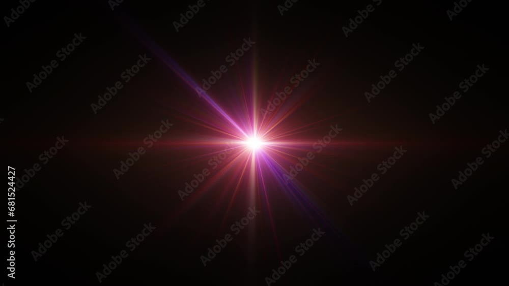 4K loop center glow colorful optical flare rays light on black abstract ...