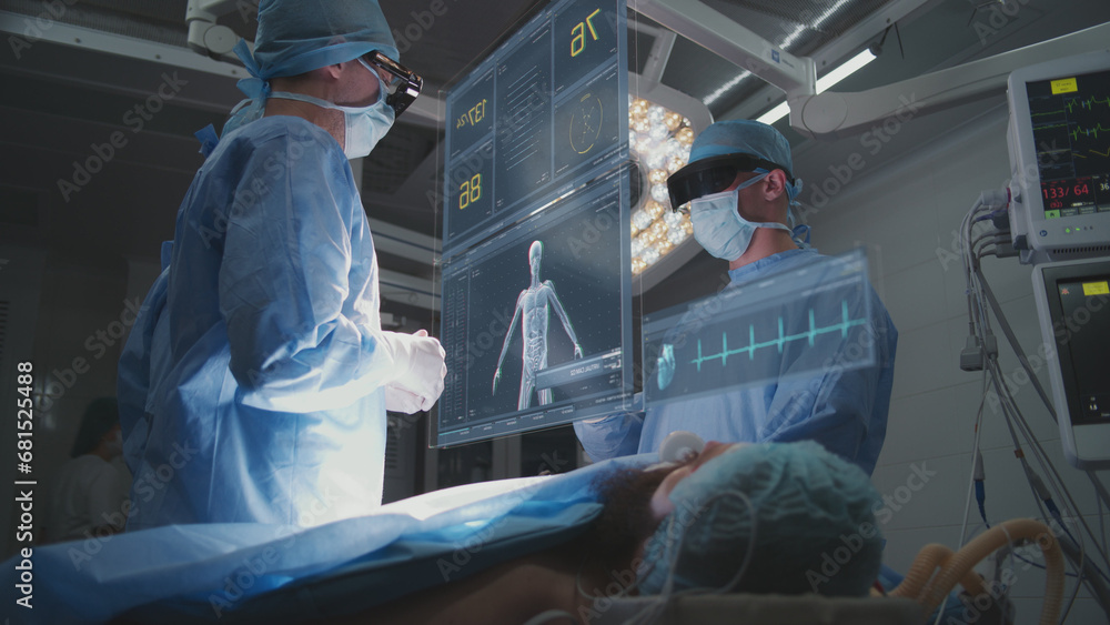 Doctors perform surgery in hospital operating room wearing AR headsets ...