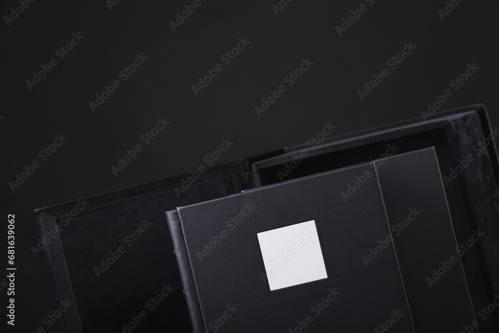 Two beautiful leather black bound books in box with soft fabric ...