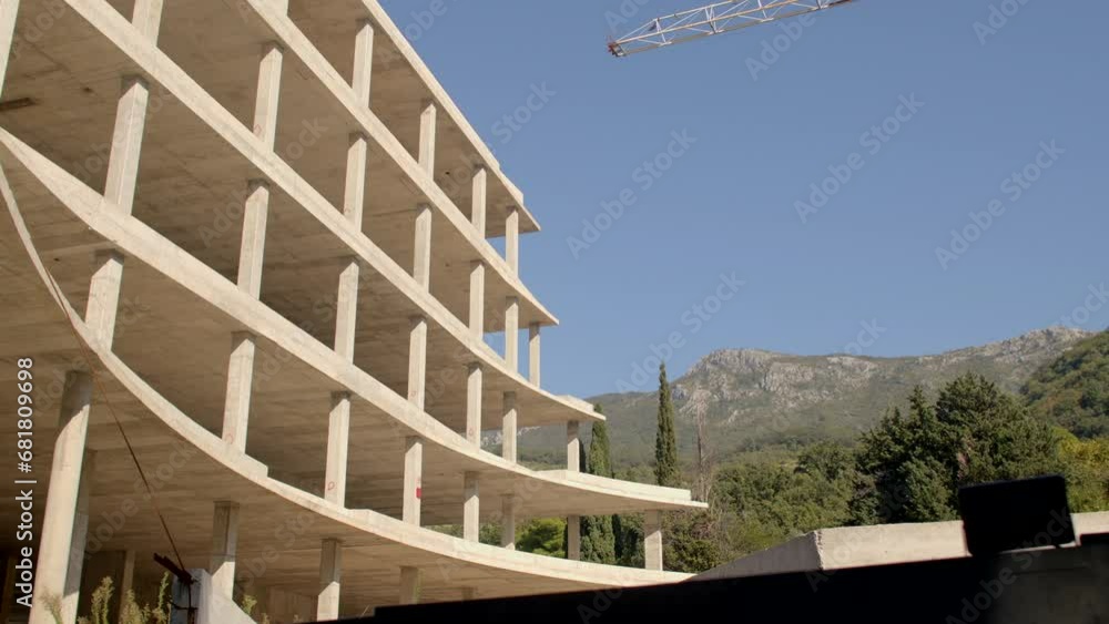 Concrete frameworks of under-construction buildings background ...