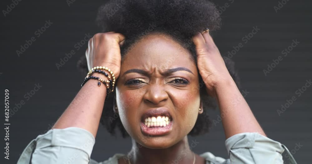 Angry, woman and frustrated face in studio with dark background and ...