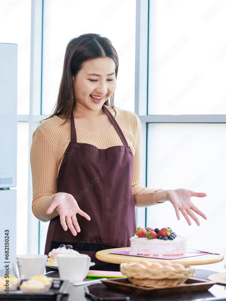 Asian beautiful female baker bakery pastry chef wears apron standing ...