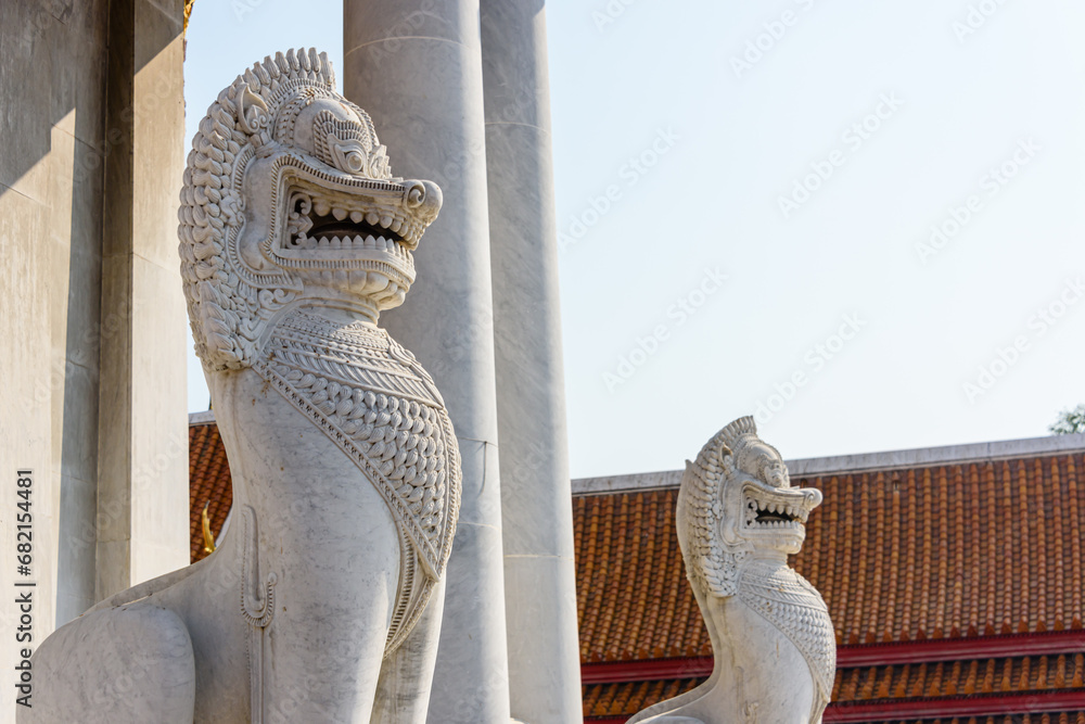 Singa (traditional mythological lion) guarding the entrance of Wat ...