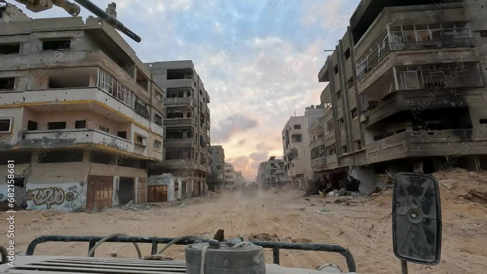 Israeli Humvee forward patrol advance through a built-up area after ...