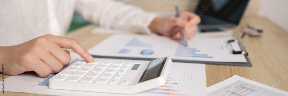 Head of accounting is recording the company's financial growth ...