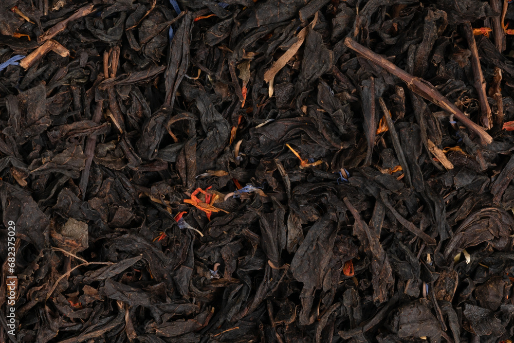 Pile leaf tea with various additives background, top view. Heap of ...