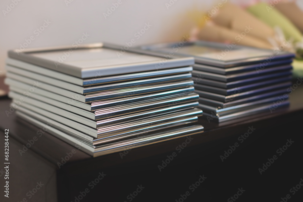 Pile of certificates in golden and silver frames, reward certificate ...