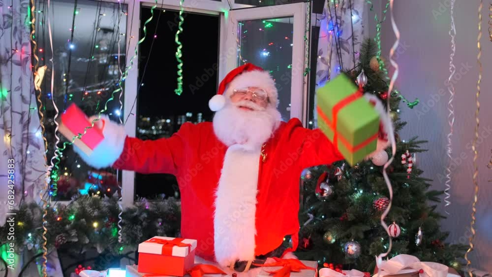 Funny dancing Santa Claus with gifts. Background of festive Christmas ...