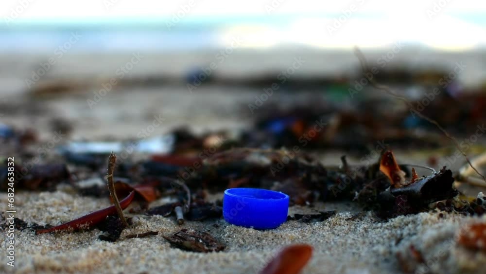 Blue Plastic Water Bottle Cap on the Sand at a Beach in Brazil Mixed ...