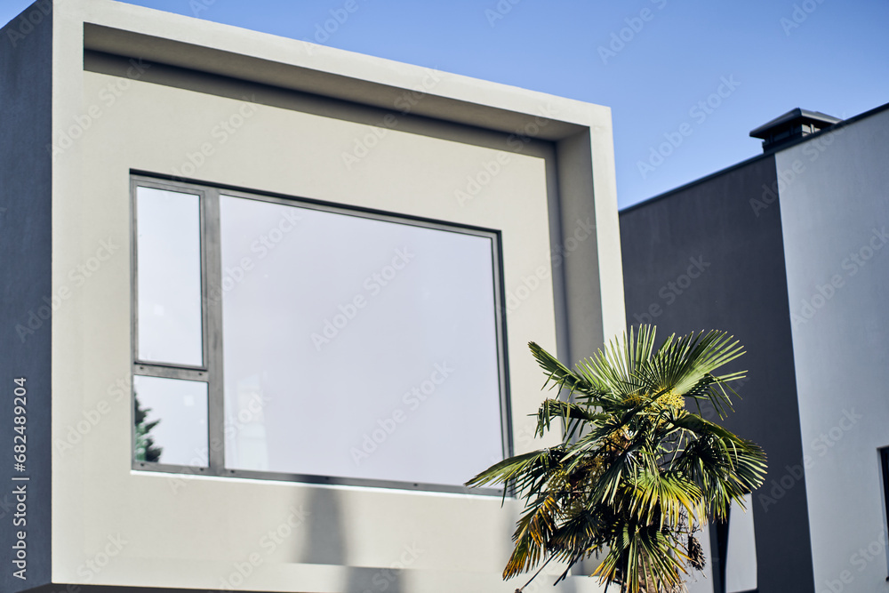 Large mirrored window. Modern elements in modern architecture ...