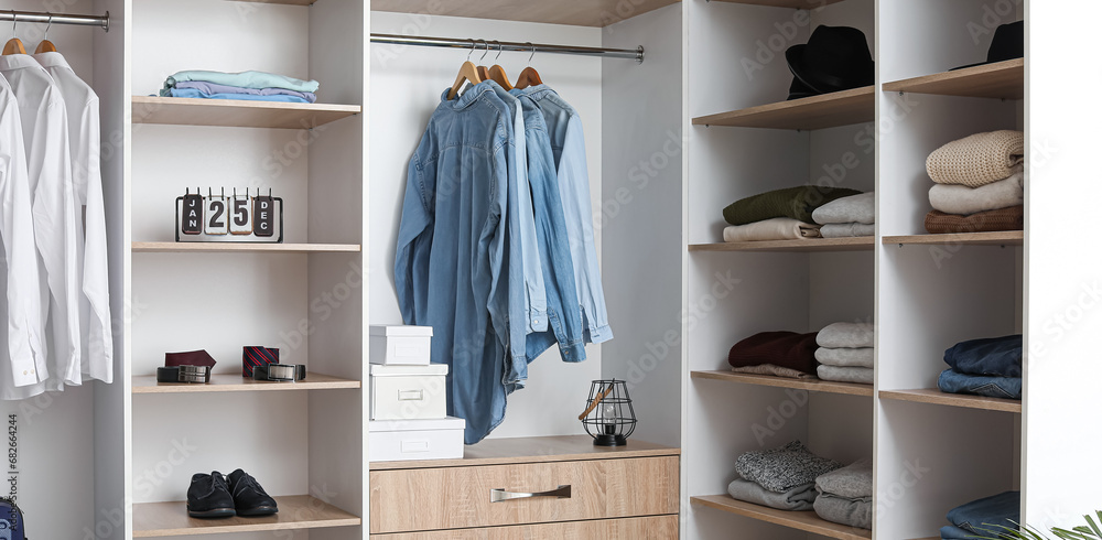Poster Wardrobe with clean clothes in dressing room – Wall Art | UkPosters