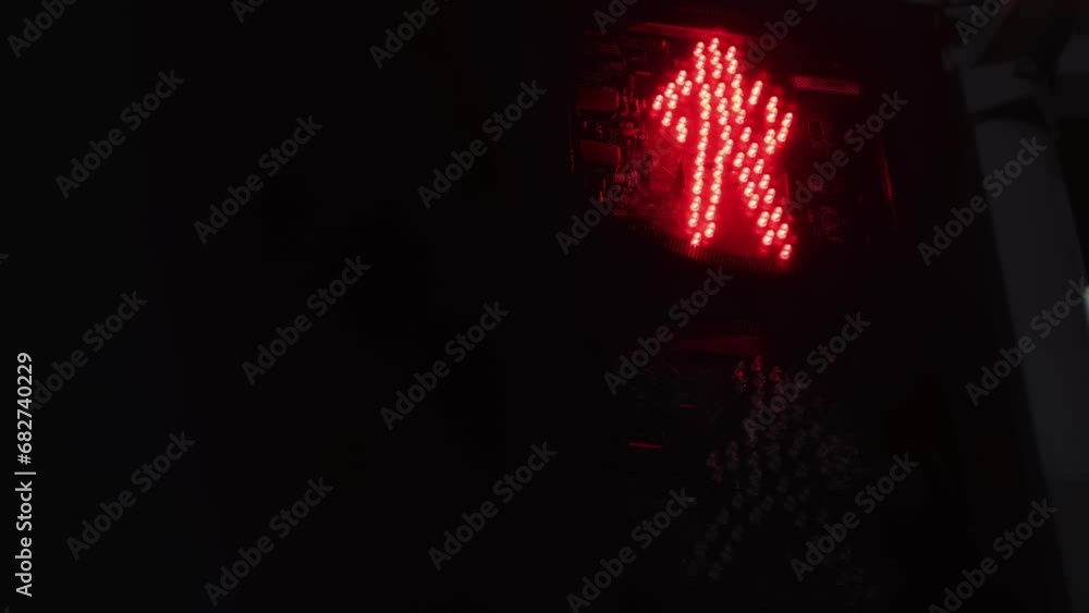 New modern LED traffic light for pedestrians at night, close up. Little ...