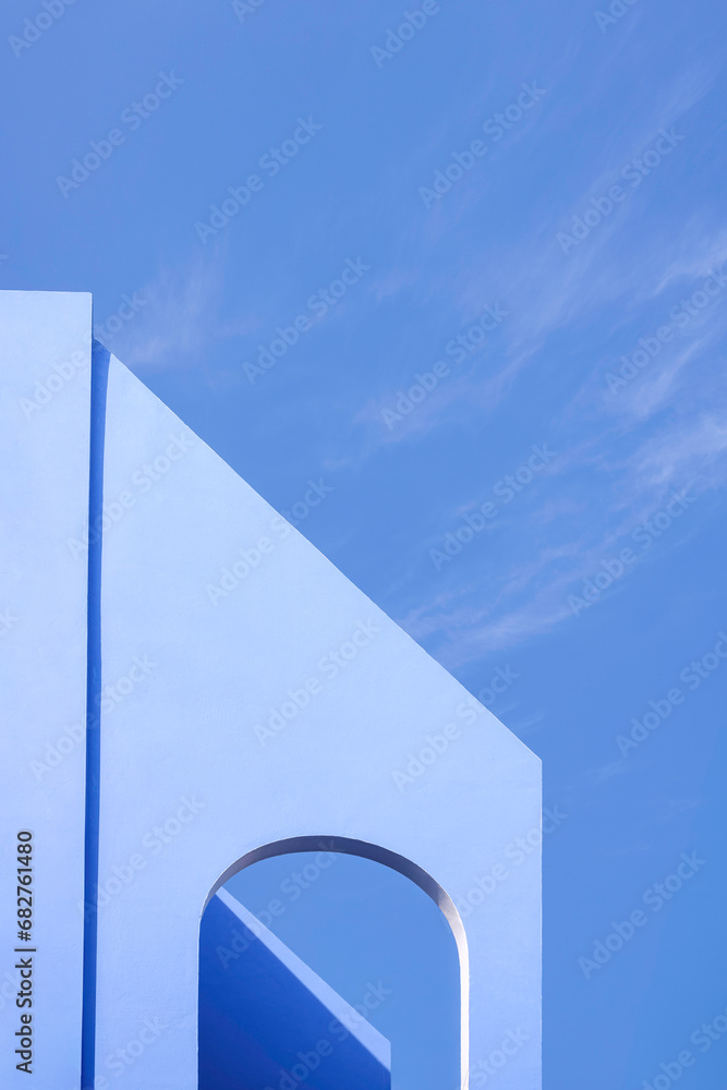 Two arch concrete facade walls on high section of vintage house ...