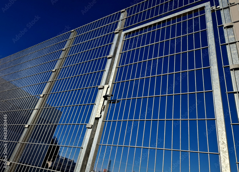 strong galvanized welded mesh fencing is used around industrial halls ...