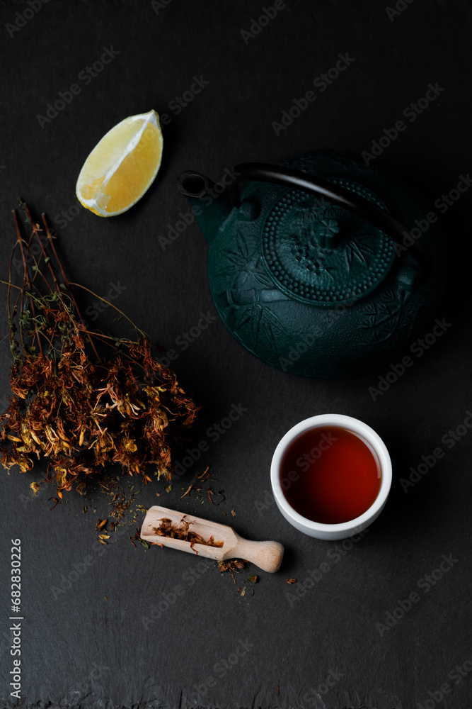 Hypericum Perforatum Herbal Tea In Teapot And small teacup and piace of ...
