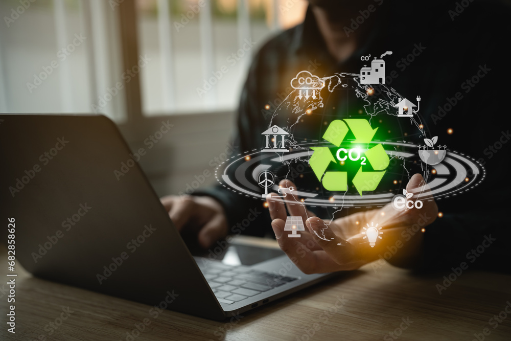 Man holding earth use laptop recycle virtual screen symbol modern ...