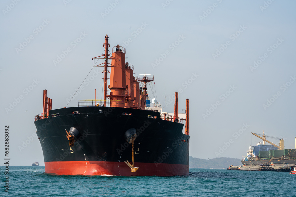 cargo ship in the ocean for export import goods from cargo yard port to ...