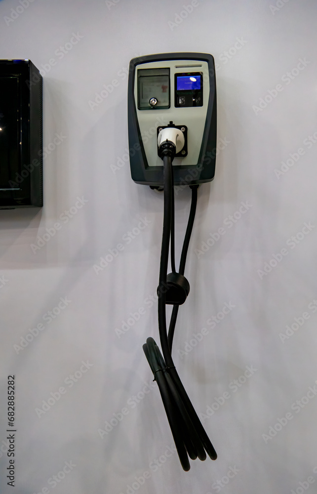 Car charging power station with two connectors. Stock Photo | Adobe Stock