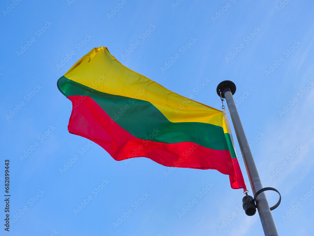 The national flag of Lithuania consists of a horizontal tricolor of ...