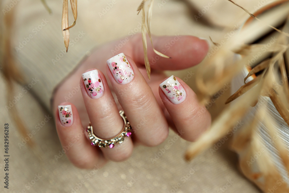 Nail design on short milk nails with golden and pink glitter inside the ...