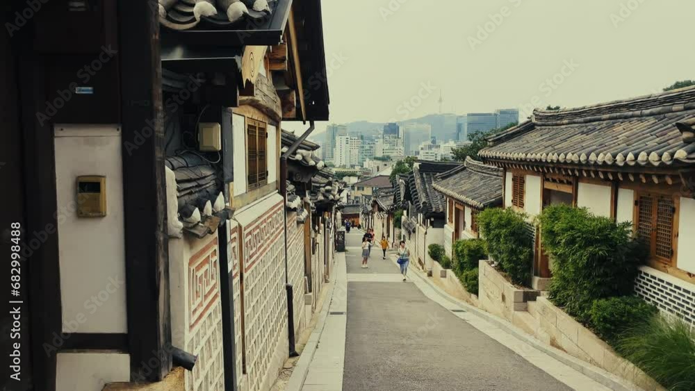 Bukchon Hanok Village street view with urban buildings in Seoul Stock ...