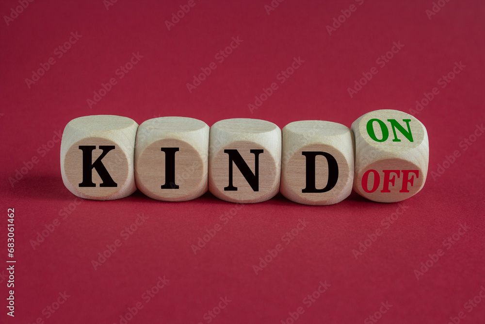 Turned wooden cubes and changes red word Kind off to Kind on. Beautiful ...