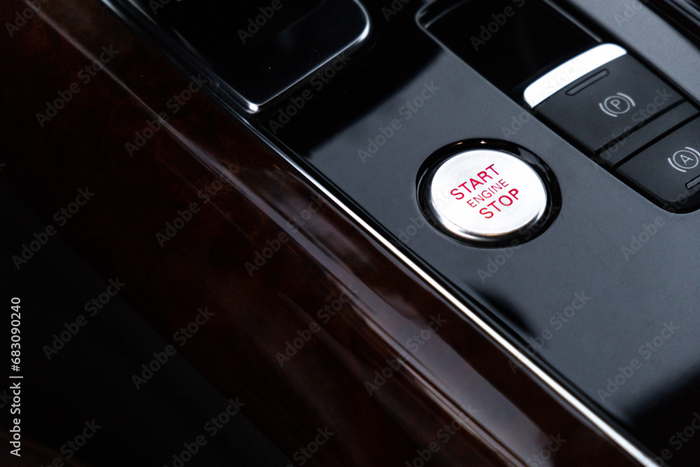 Start stop engine button Interior of modern luxury car. Details of ...
