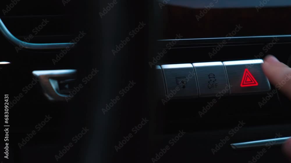 Red emergency button flashing Interior of modern luxury car. Details of ...