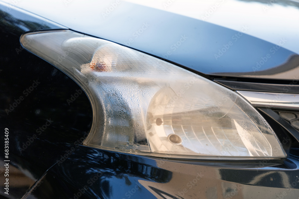 Water droplets remain inside the car headlights. Car problems caused by ...