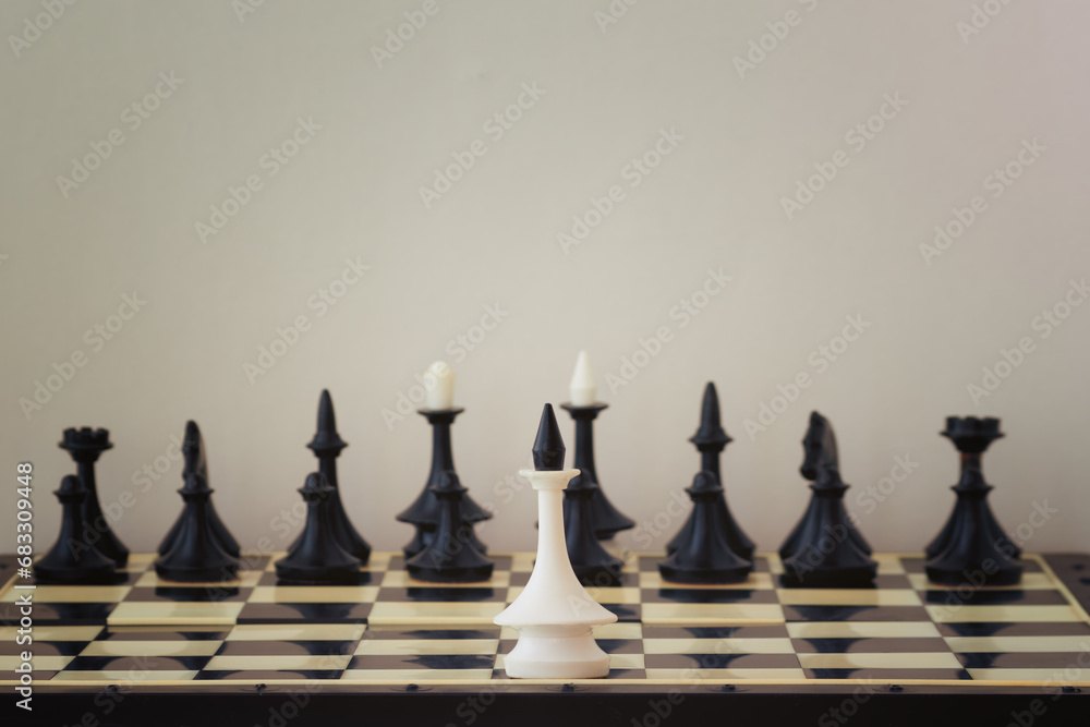 One white king against all black chess pieces. One against all, power ...