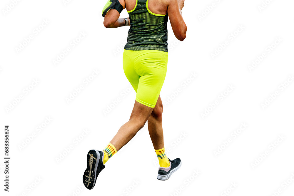 side view female runner running marathon race in bright green tights ...