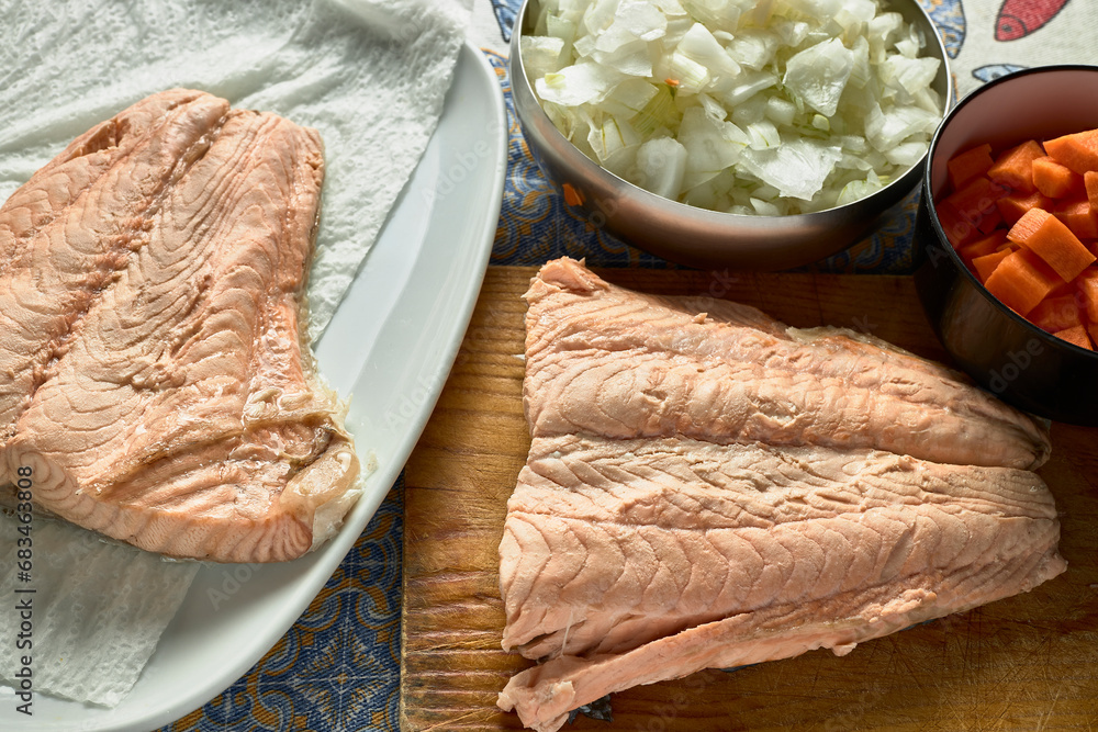 Salmon loins. Two pieces of the tail of a salmon to be cooked with ...