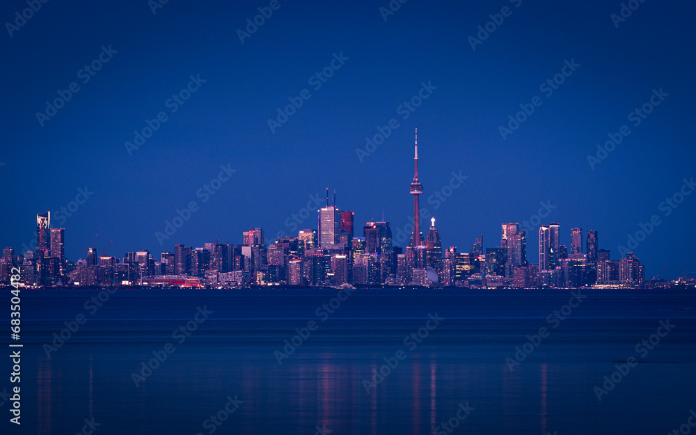 View of Toronto skyline at dusk. Stock Photo | Adobe Stock