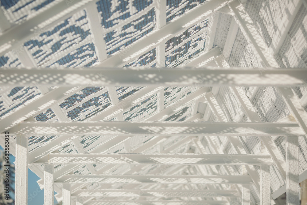 Frozen grate in winter. lattice with frost on the background of the ...