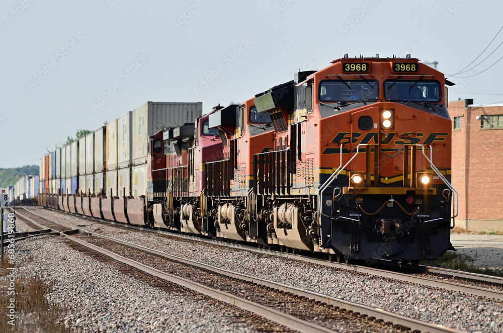 A Burlington Northern Santa Fe Railway intermodal freight train, led by ...