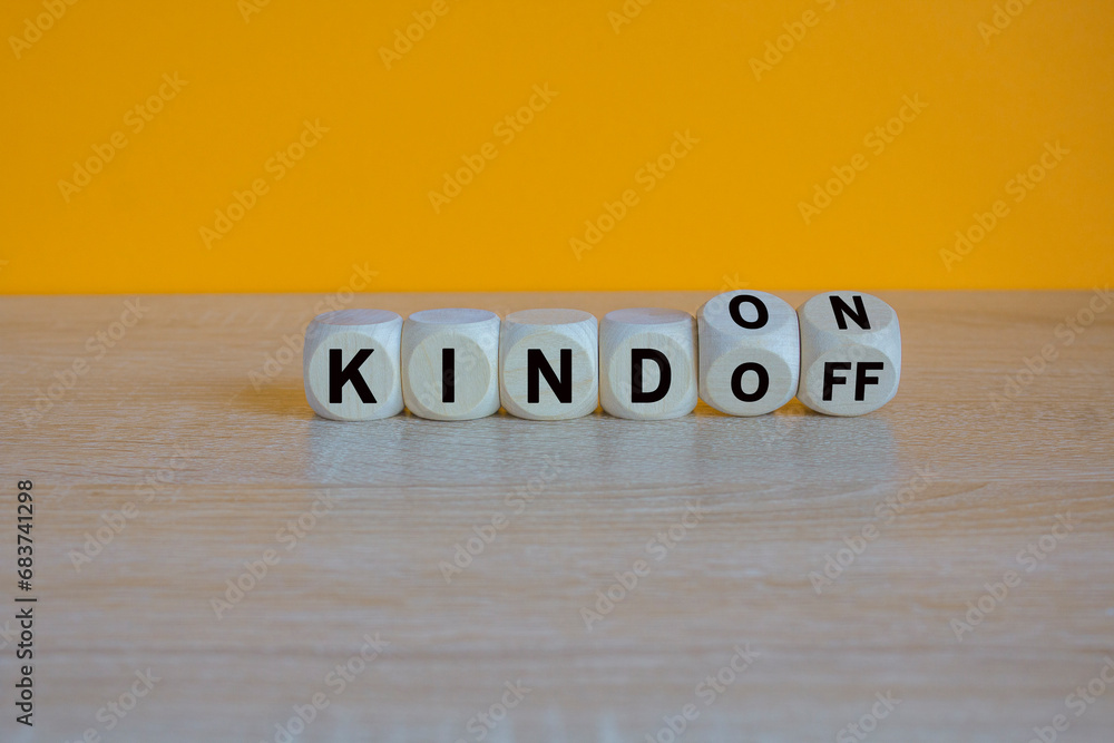 Kind on or off symbol. Turned wooden cubes and changes word Kind off to ...