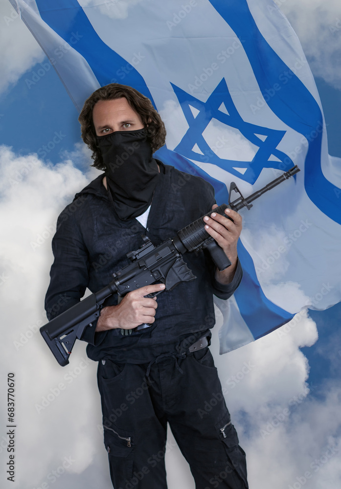Jewish man in black military uniform and mask with machine gun standing ...