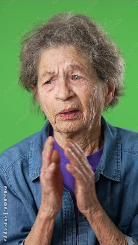 Vertical video of unhappy irritated frustrated sad angry elderly senior ...