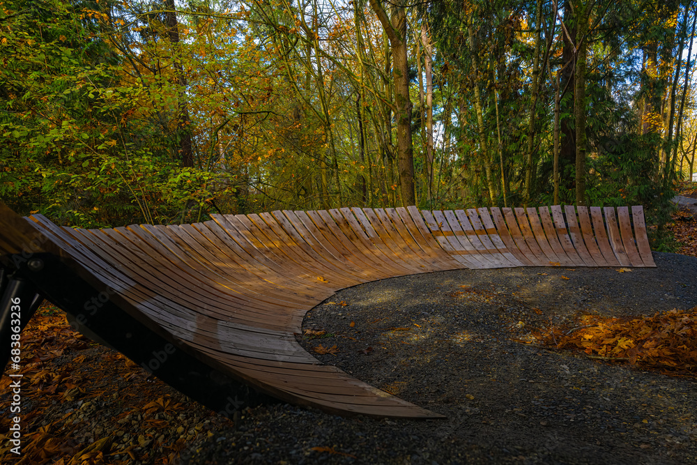 2023-11-18 A CIRCLE WOODEN RAMP FOR A COMMUNITY BMX TRACK IN A WOODED ...
