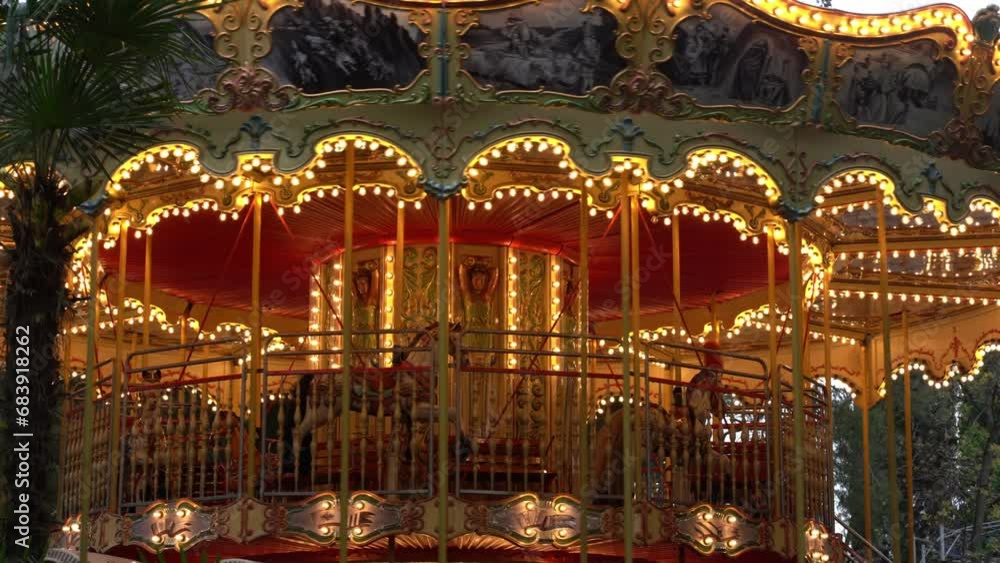 Vidéo Stock Children's carousel in the amusement park. The magic ...